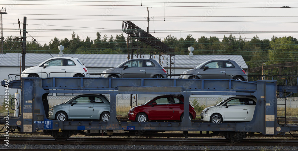 Transport of cars on railway platforms. Car carrier. Autorak Stock ...