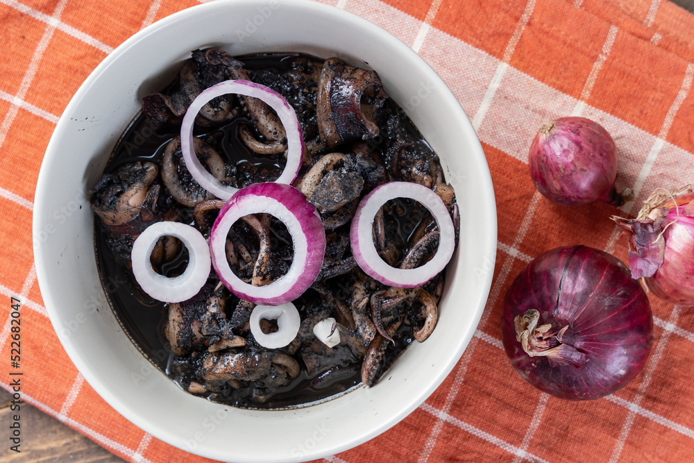 a tasty Filipino squid dish that uses Adobo method, also known as ...