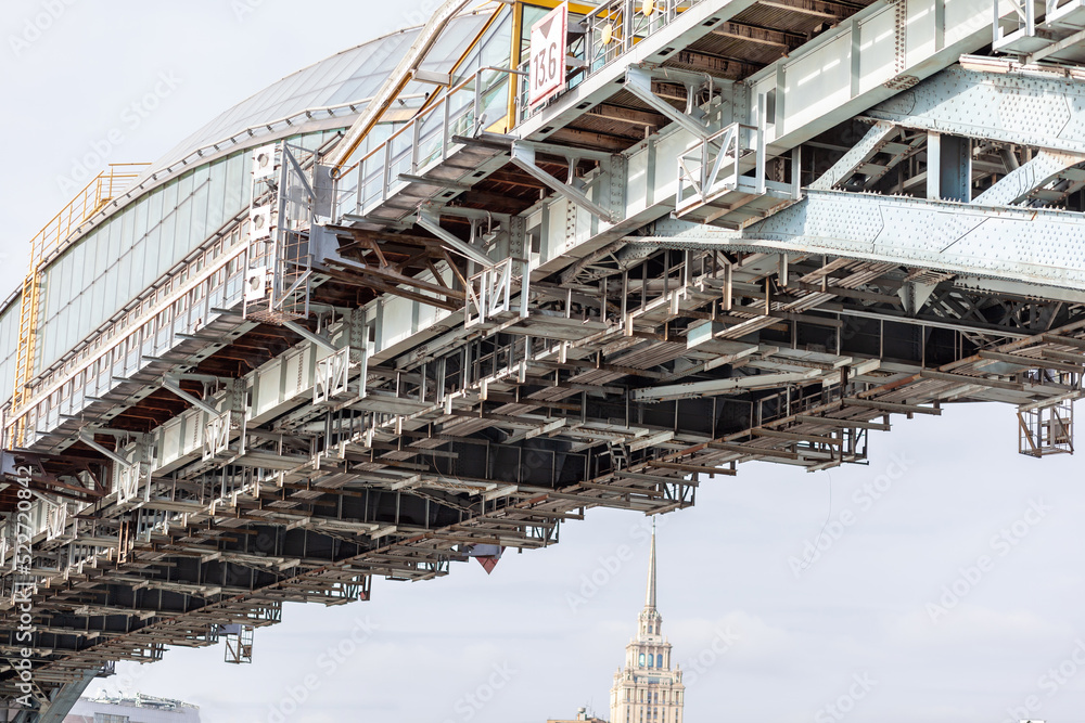 Metal poles pedestriaMetal poles pedestrian covered bridge with lots of ...