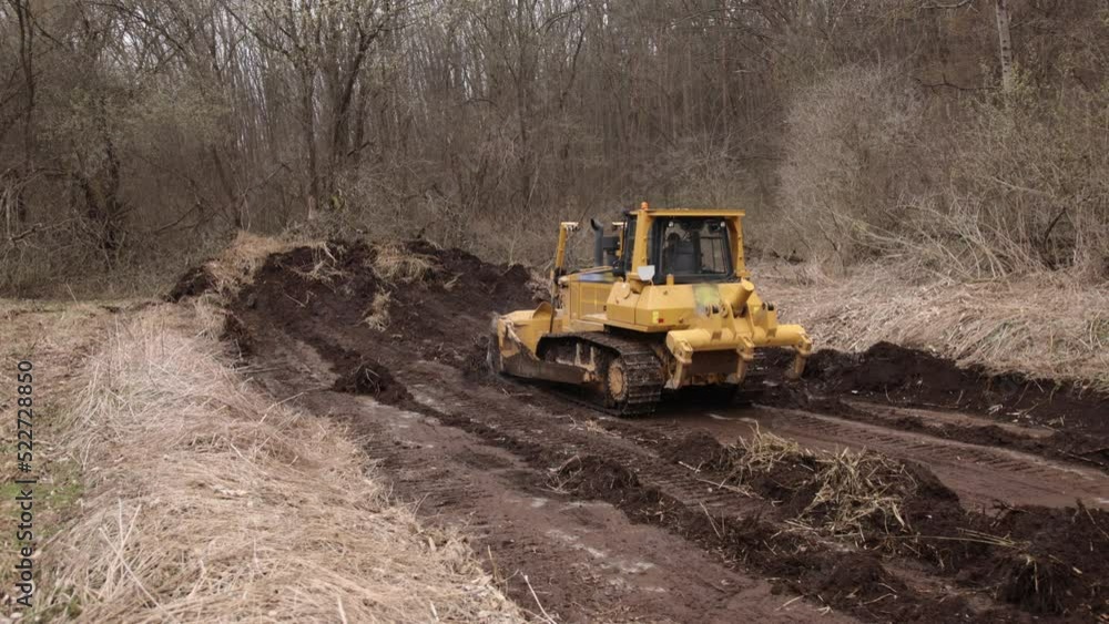 Vidéo Stock Construction machinery equipment, earth building bulldozer ...