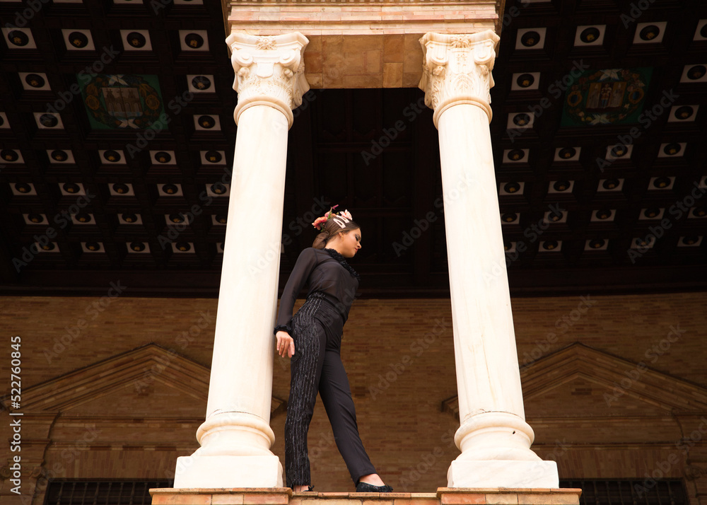 Beautiful teenage flamenco dancer with brown hair and dressed in dance ...