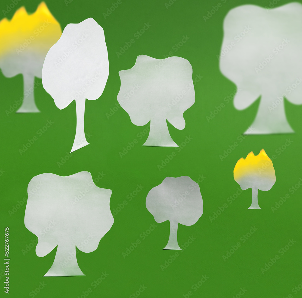 Paper tree on a green background with hard shadows. Pattern. The ...