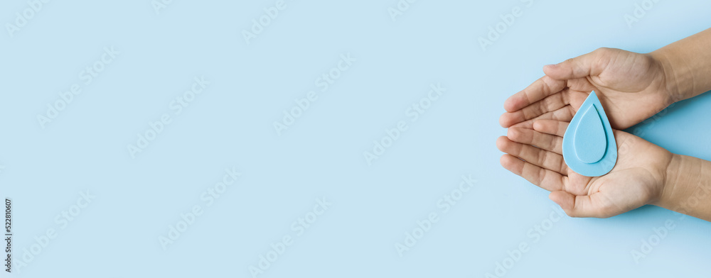 World Polio day. October 24. Blue drop in hands of child is symbol of ...