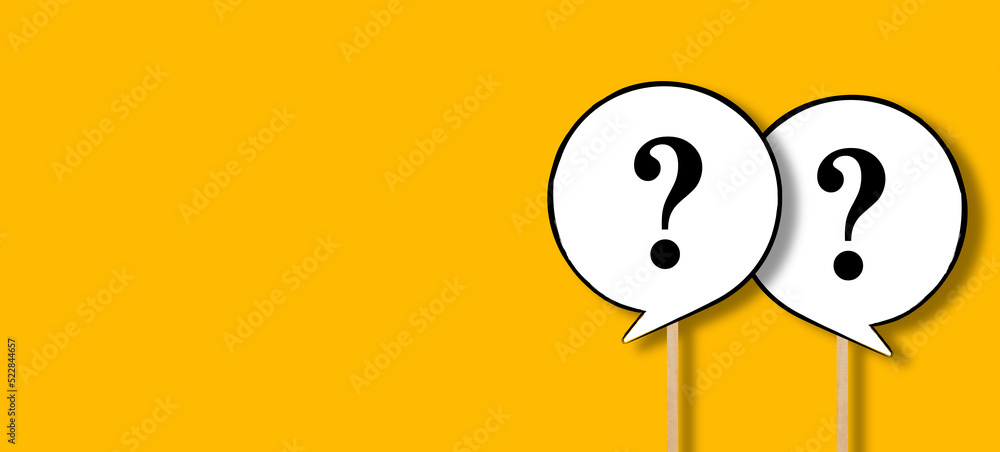 Question mark design and speech bubbles with wooden sticks on yellow ...