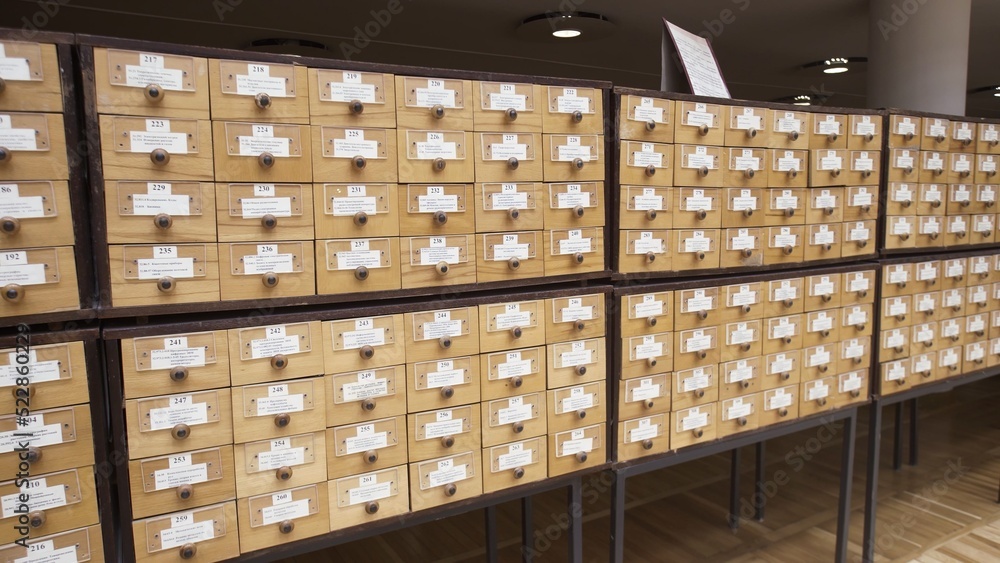 4K. Database concept. vintage cabinet. library card or file catalog ...