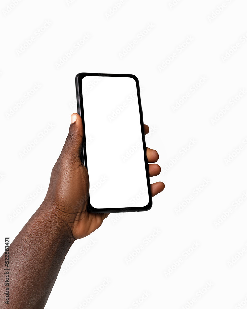 Black hand holding phone facing camera isolated on white background ...