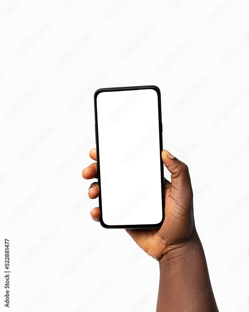 Black hand holding phone facing camera isolated on white background ...
