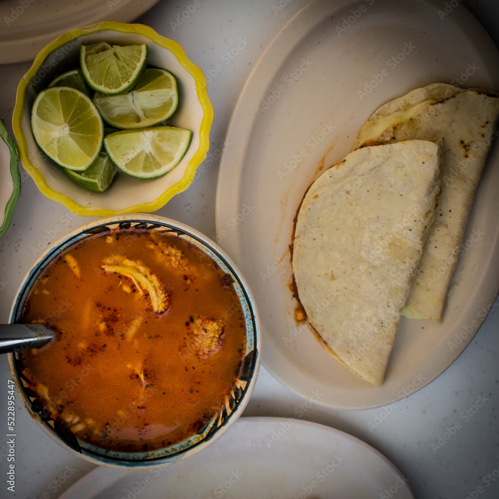 platillo mexicano de menudo y quesadillas Stock Photo | Adobe Stock