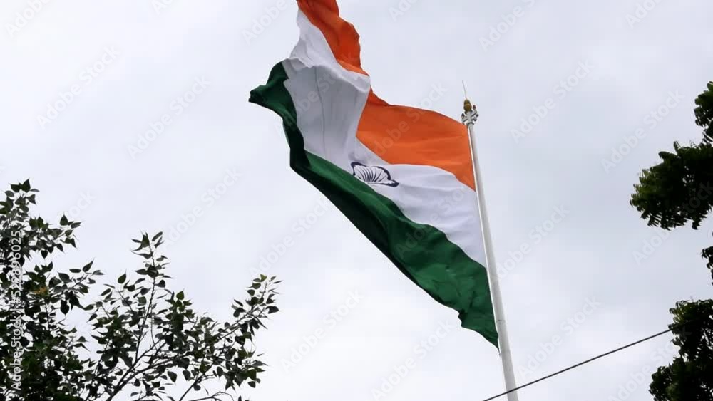 India flag flying high at Connaught Place with pride in blue sky, India ...