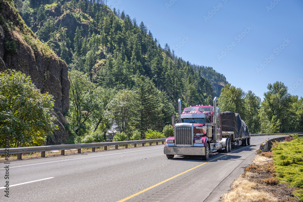 Stylish classic burgundy big rig American semi truck tractor ...