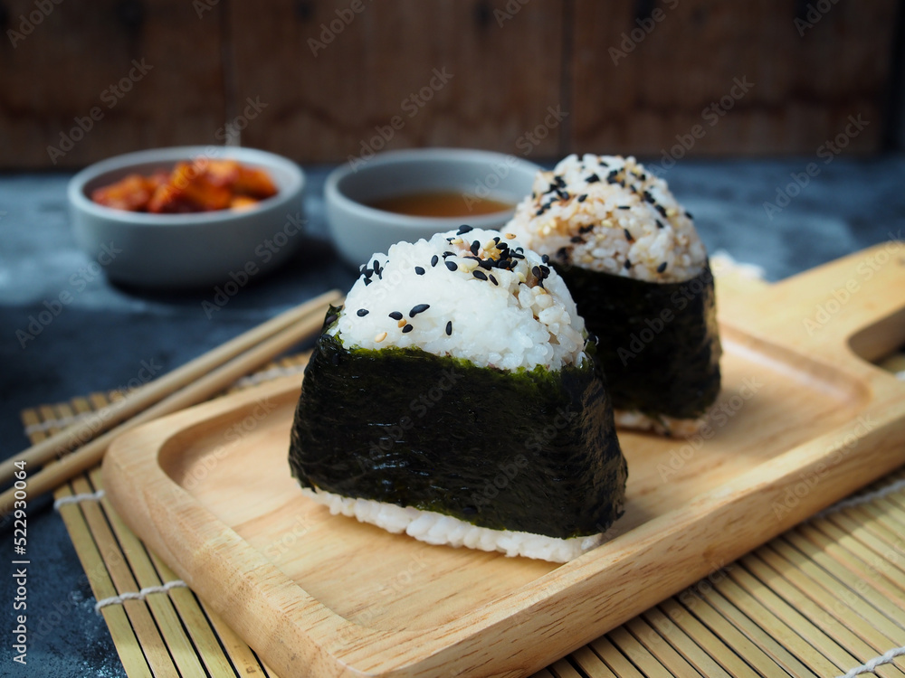 Onigiri Japanese traditional food, steamed rice in triangle shape wrap ...