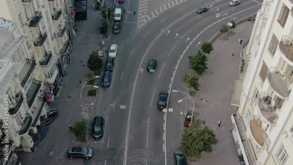two cars drive on a city road Stock Video | Adobe Stock