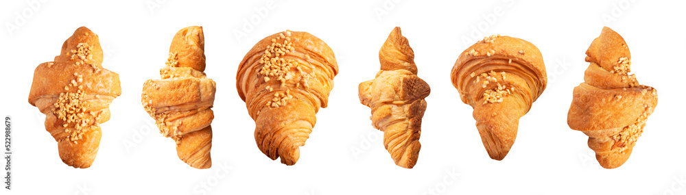 Fresh classic french croissant sprinkled with nuts isolated on white ...