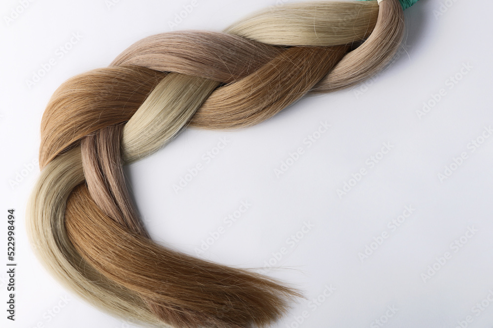 Braided hair sections for extension on white background. Stock Photo ...