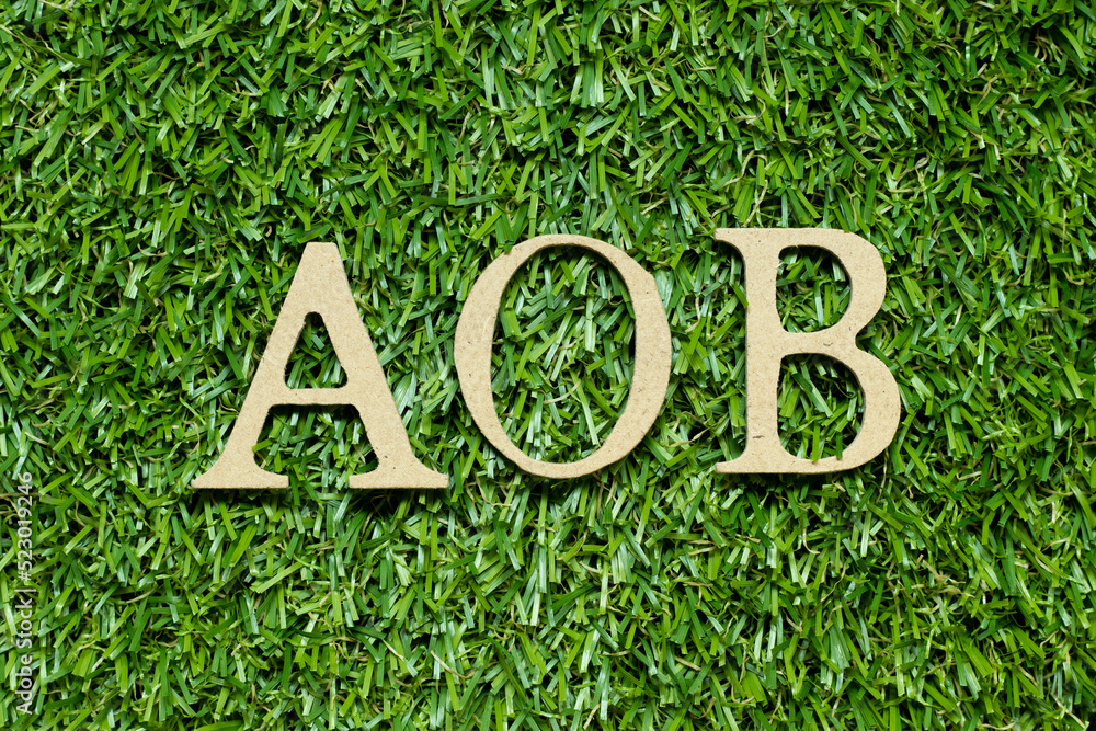 Wood alphabet letter in word AOB (abbreviation of Assignment of ...