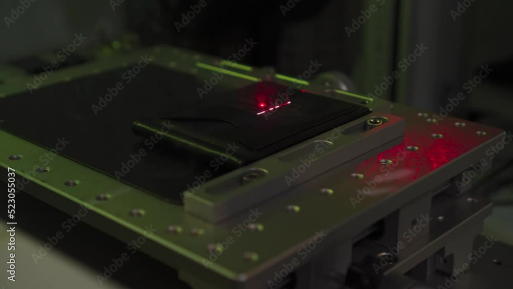 Laser engraving process camera passing by horizontally,working platform ...