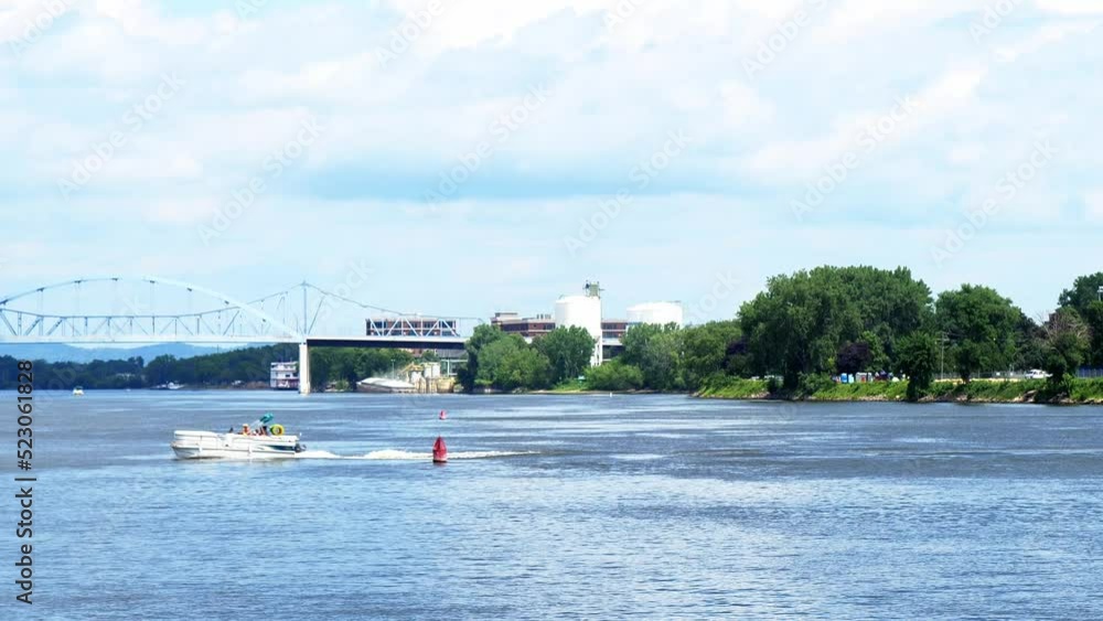 Mississippi River scene at La Crosse, Wisconsin, with a pontoon, buoys ...