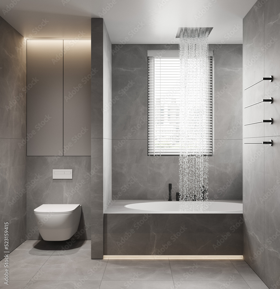 Shower water falling in bathtub near window with white toilet in modern ...