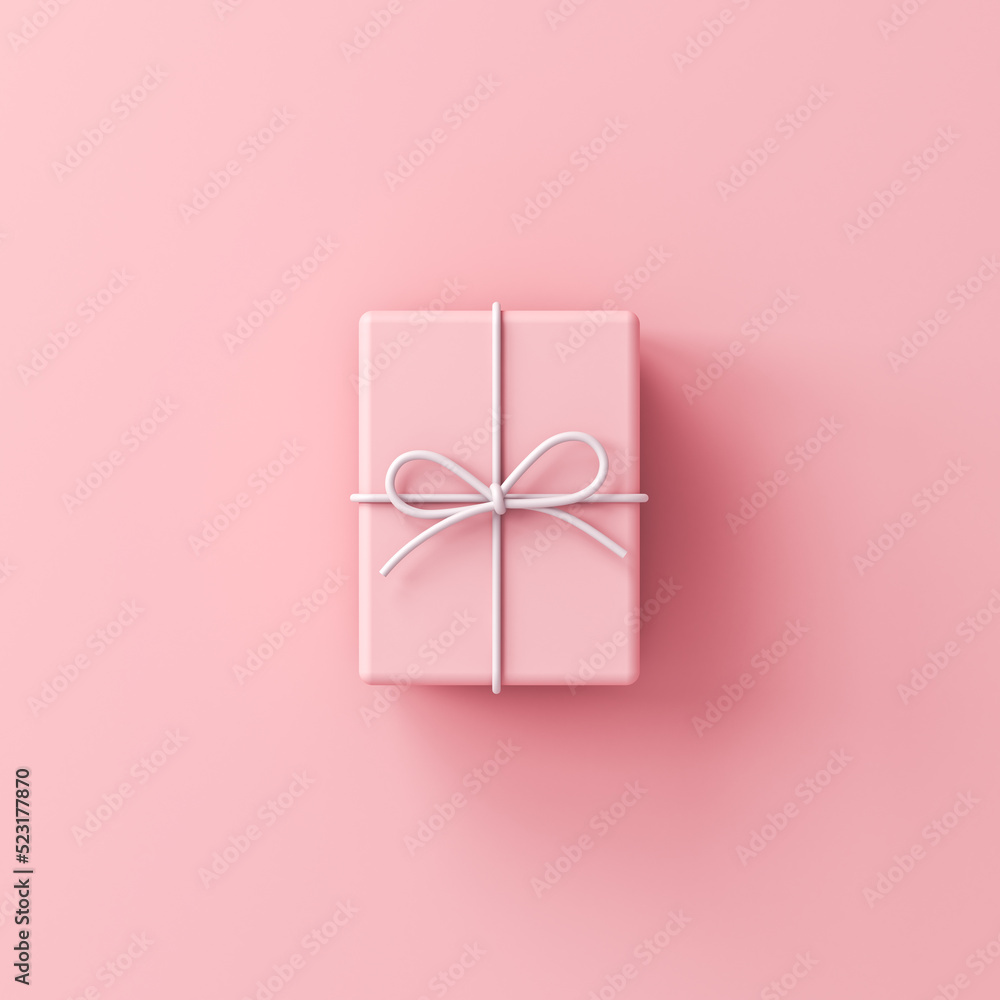 Minimal pink gift box with white rope ribbon bow isolated on pink ...