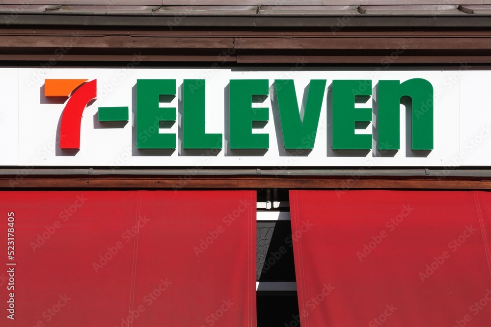 Aarhus, Denmark - March 4, 2022: 7-Eleven logo on a wall. 7-Eleven is ...
