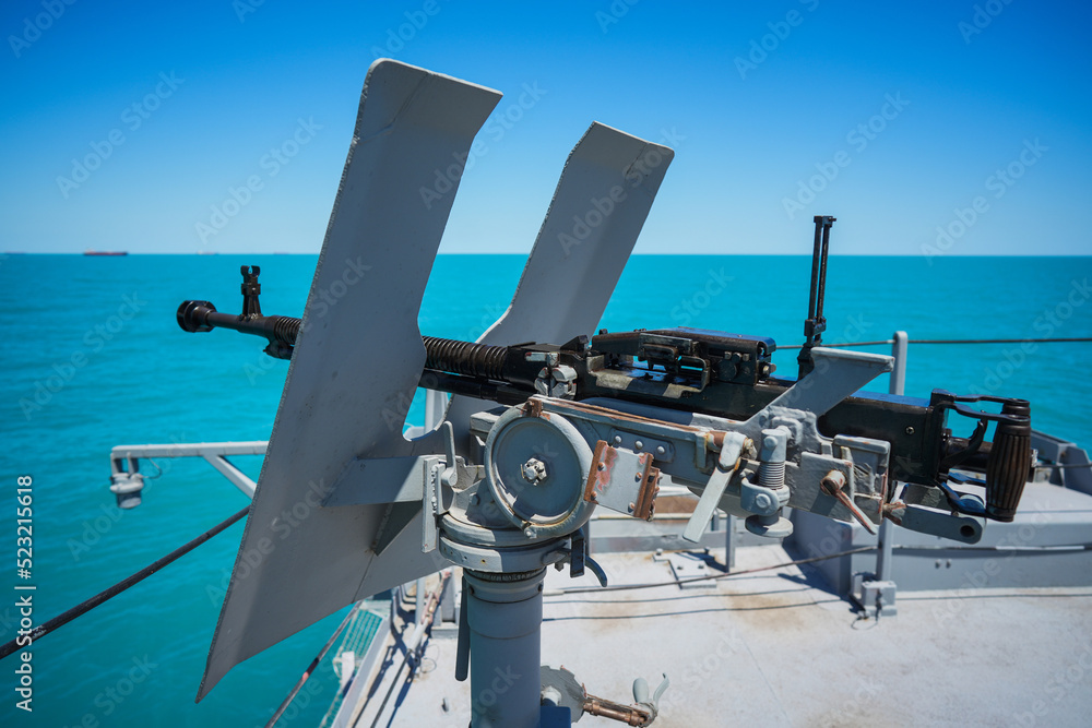 Automated machine gun on the deck of a military ship Stock Photo ...