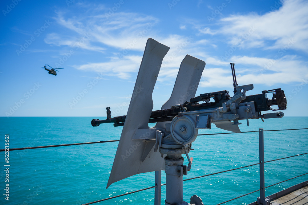 Automated machine gun on the deck of a military ship Stock Photo ...