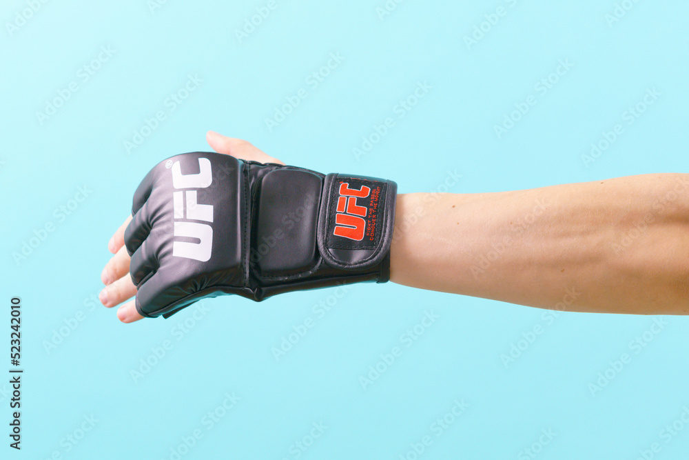 Las Vegas, USA - Aug 9, 2022: A man's hands in black MMA UFC gloves on ...