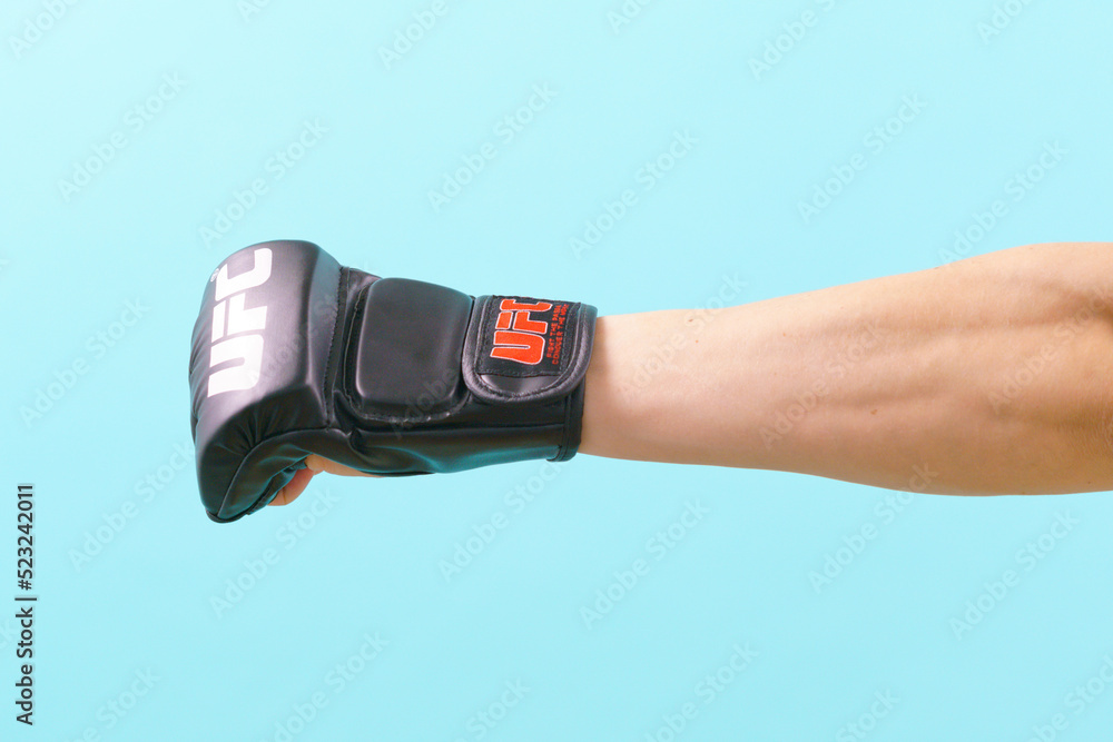 Las Vegas, USA - Aug 9, 2022: A man's fist in black MMA UFC gloves show ...