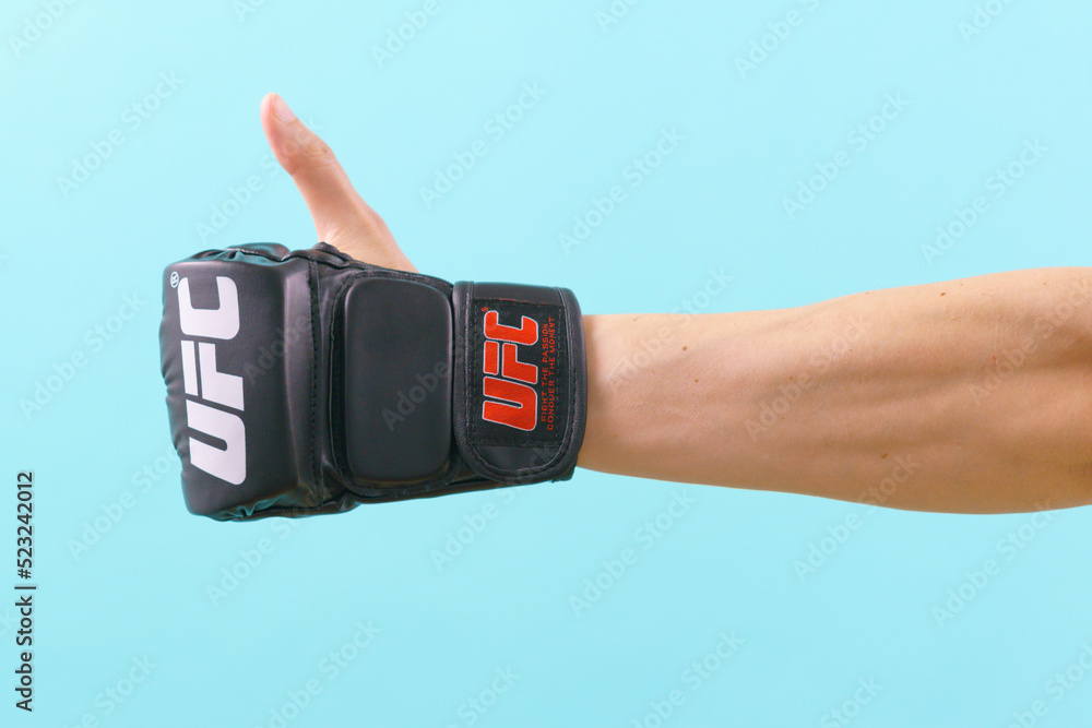 Las Vegas, USA - Aug 9, 2022: A man's hands in black MMA UFC gloves ...