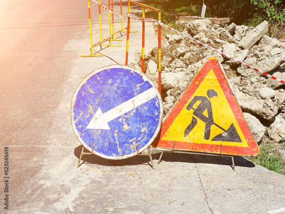 Road works sign closeup. Road sign repair work. Roadwork warning signs ...