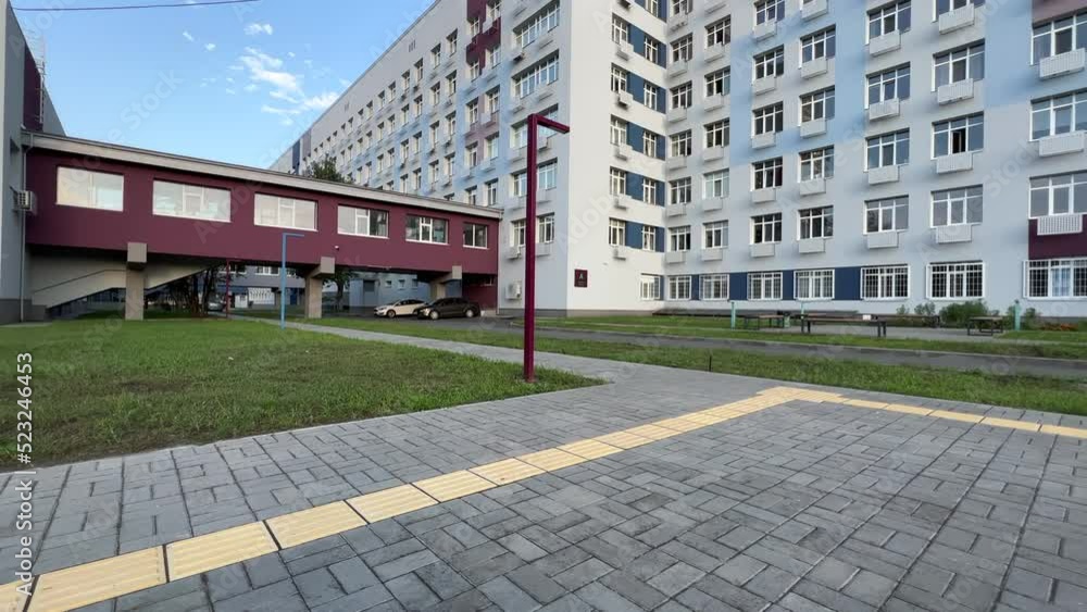 Hospital exterior with transition between buildings. Side view of ...