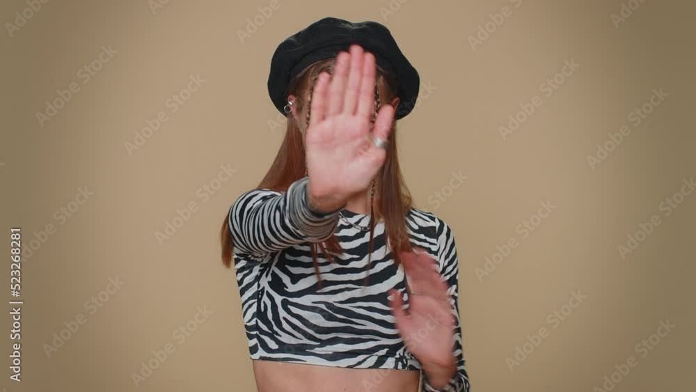 Stop. Young woman say No hold palm folded crossed hands in stop gesture ...