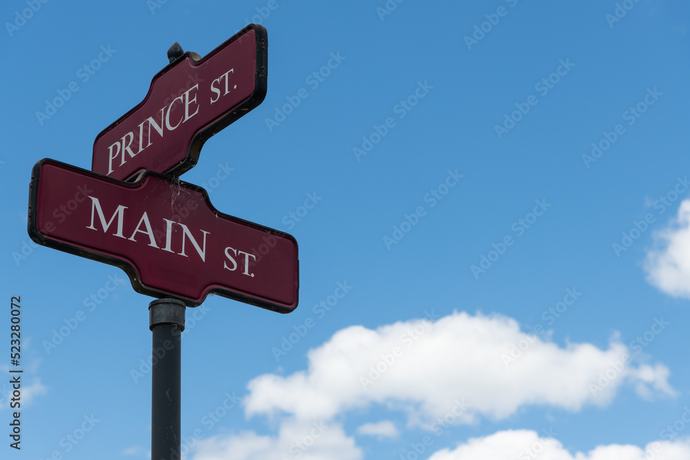 Prince and Main Street Signs Blue Sky and Clouds Stock Photo | Adobe Stock