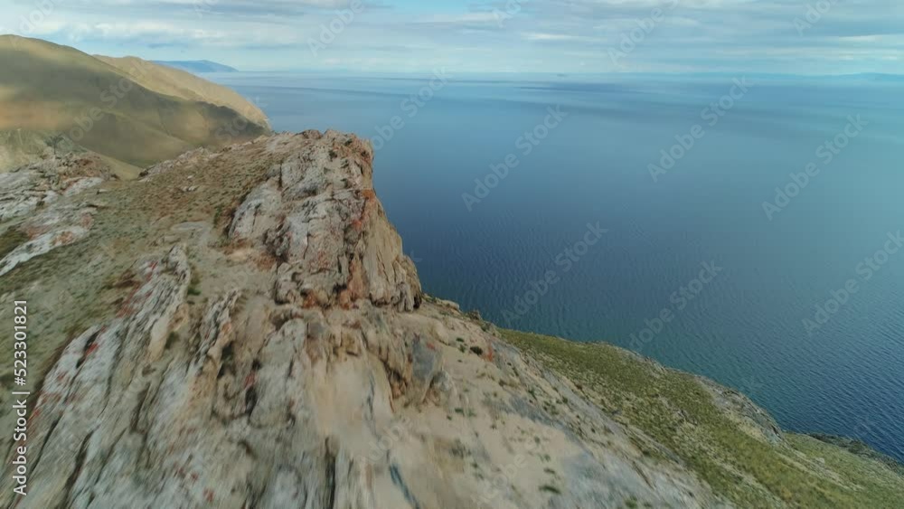 Aerial forward Breathtaking Lake Baikal coastal natural landscape ...