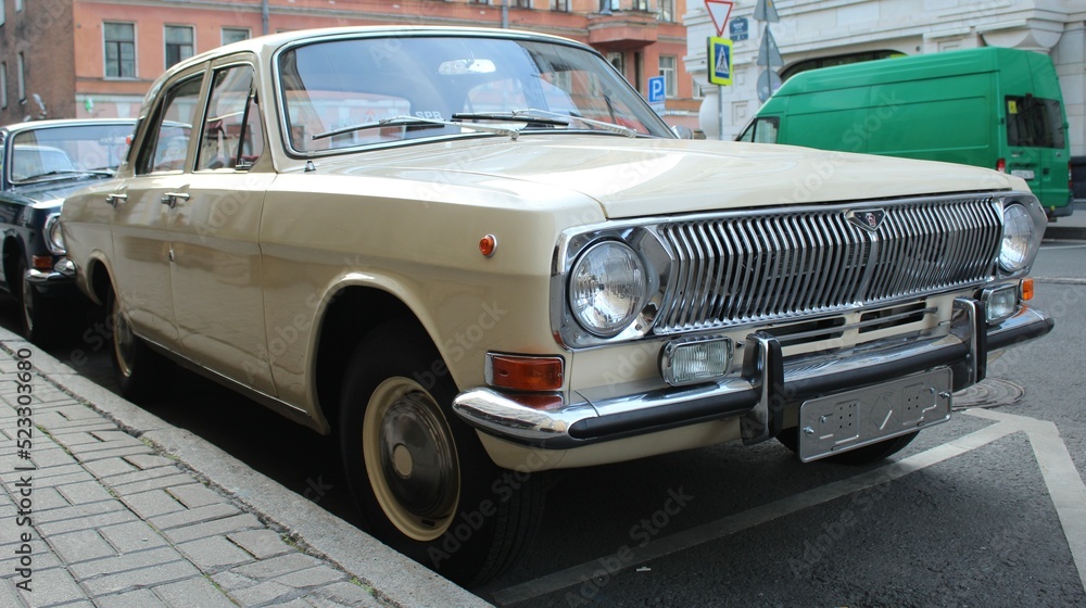 Car Volga car parked on the street, gas station in the background Stock ...