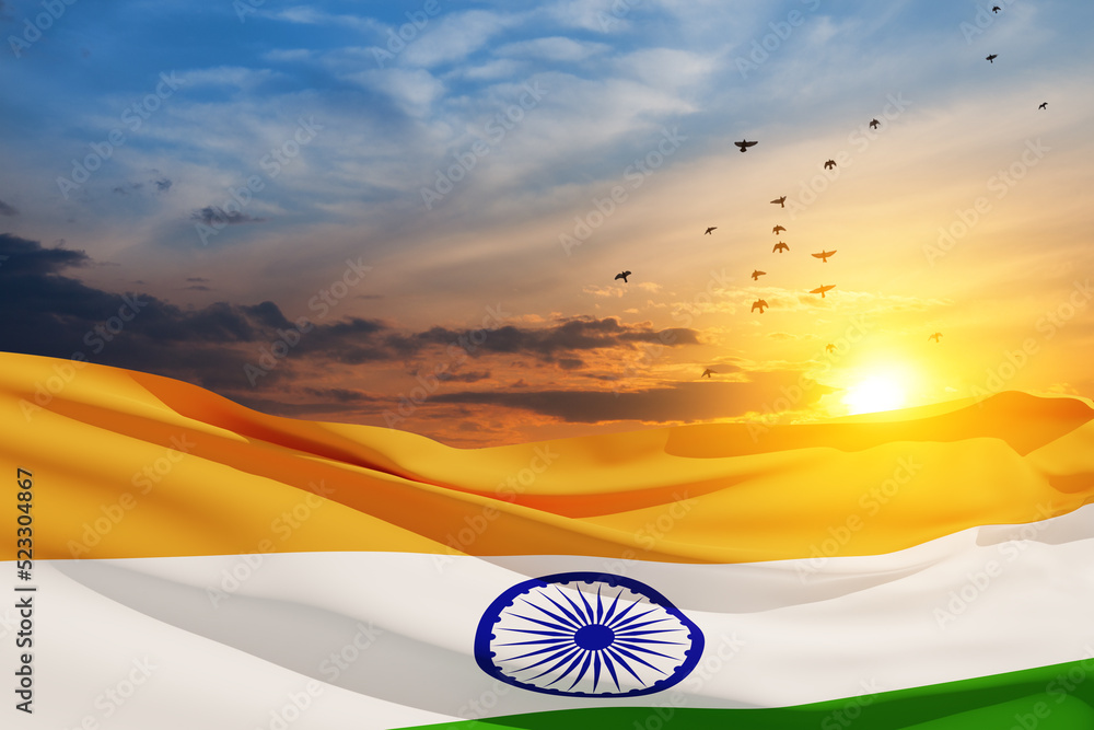 Waving India flag on sunset sky with flying birds. Background with ...