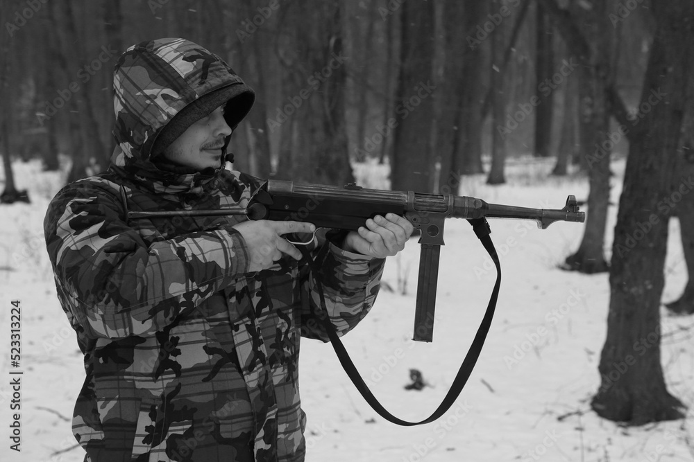 Soldier with old submachine gun in black and white Stock Photo | Adobe ...