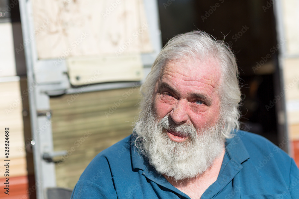 Grey haired old bloke looking at camera Stock Photo | Adobe Stock