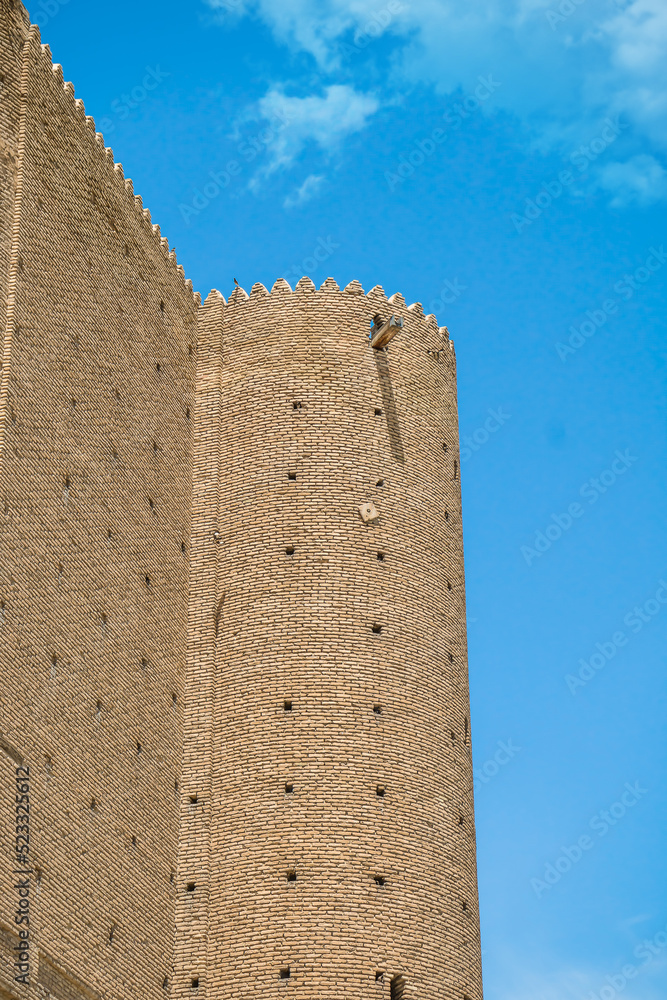 Brick tower minaret of the old Turkestan mausoleum, Kazakhstan Stock ...
