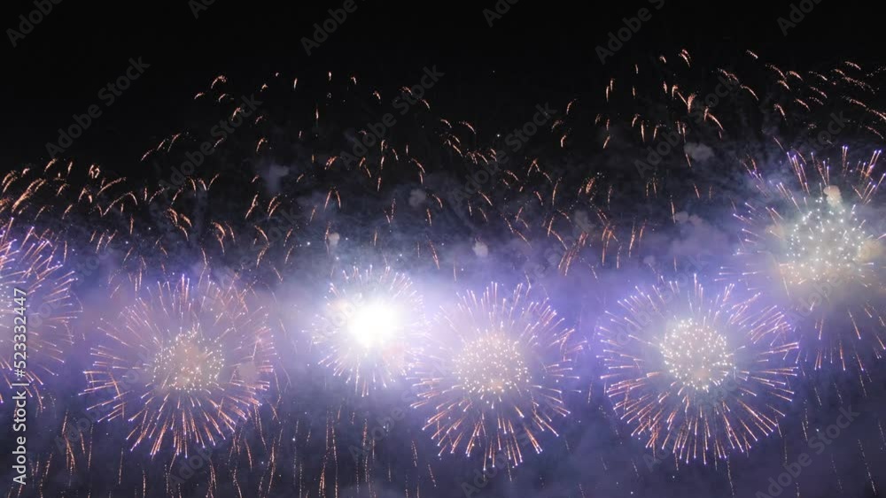 Explosions and colorful flashes at the international fireworks festival. Cannonade of the ...