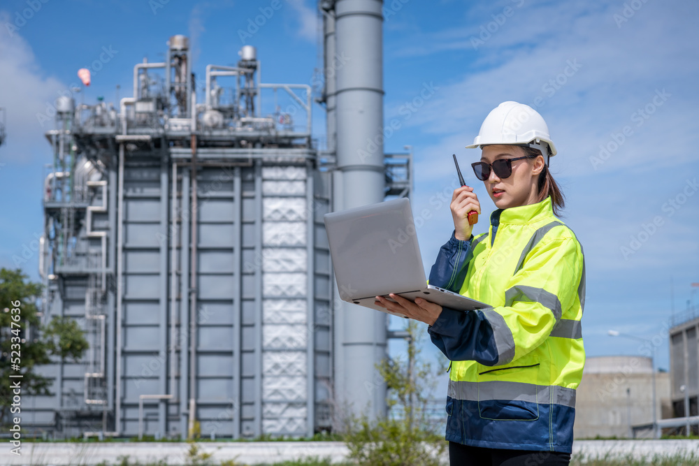 Engineer wearing uniform ,helmet and glass stand hand holding detail ...
