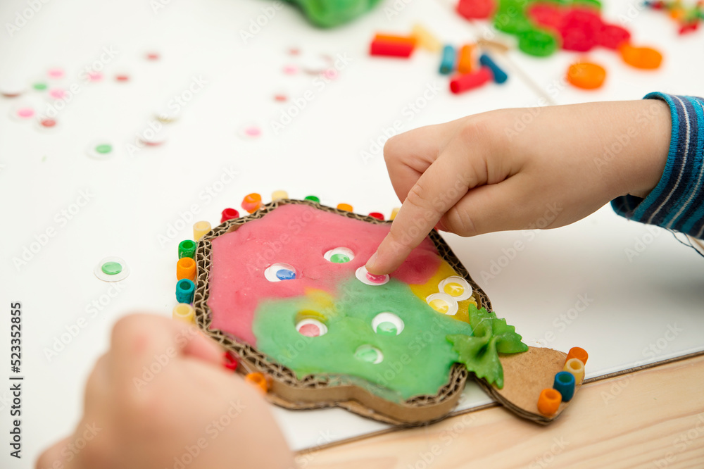DIY toy for actively explore different materials. Tool for pre-school ...