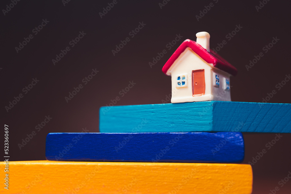 Miniature house on tangram puzzle using as property real estate and ...