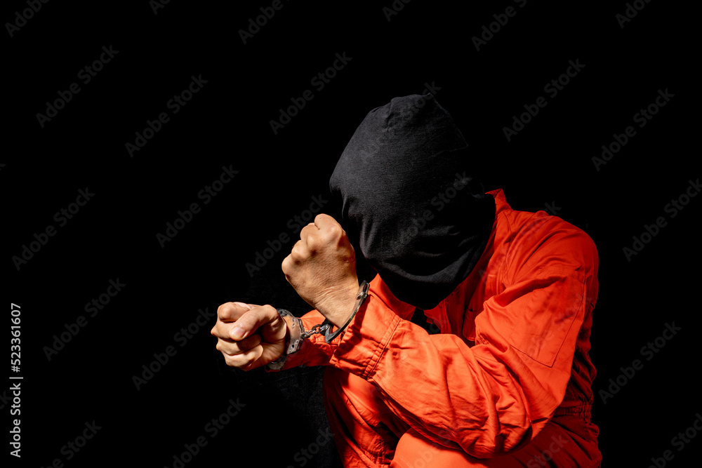 Handcuffs on Accused Criminal in Orange Jail Jumpsuit. Law Offender ...