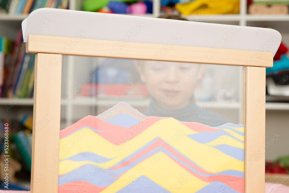 Colorful calming sand. Sand art frame for relaxing feeling pre-school ...