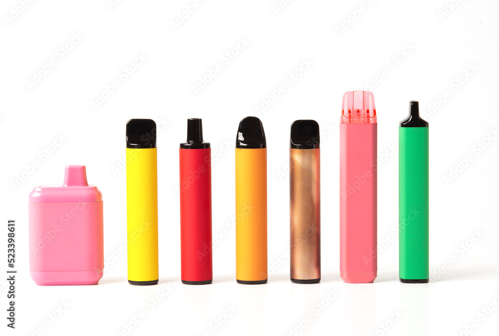 A set of colorful disposable electronic cigarettes of different shapes ...