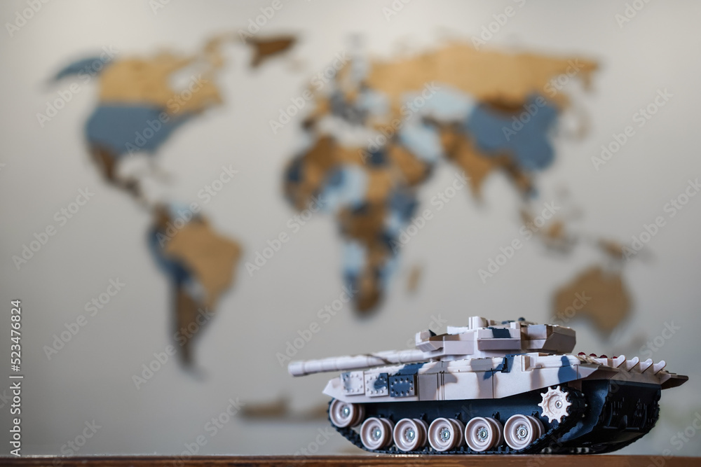 Tank on the background of the political map of the world. Conqueror ...