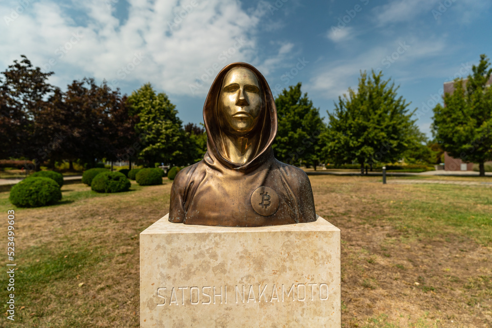 Portrait of the statue of Satoshi Nakamoto mysterious founder of ... Portrait of the statue of Satoshi Nakamoto mysterious founder of ...