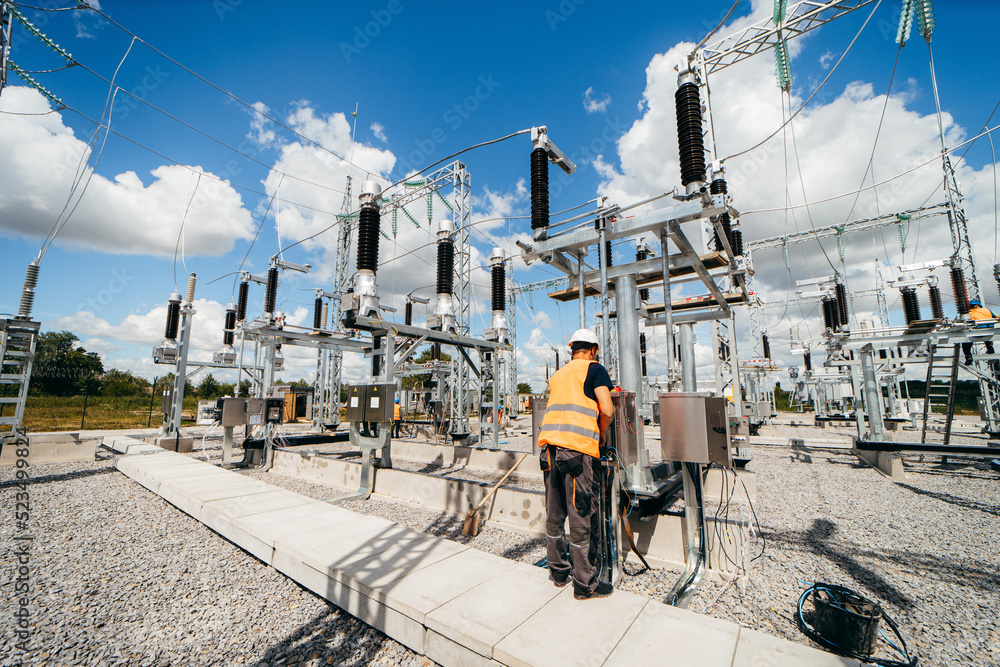 Adult electrical engineer inspect the electrical systems at the ...