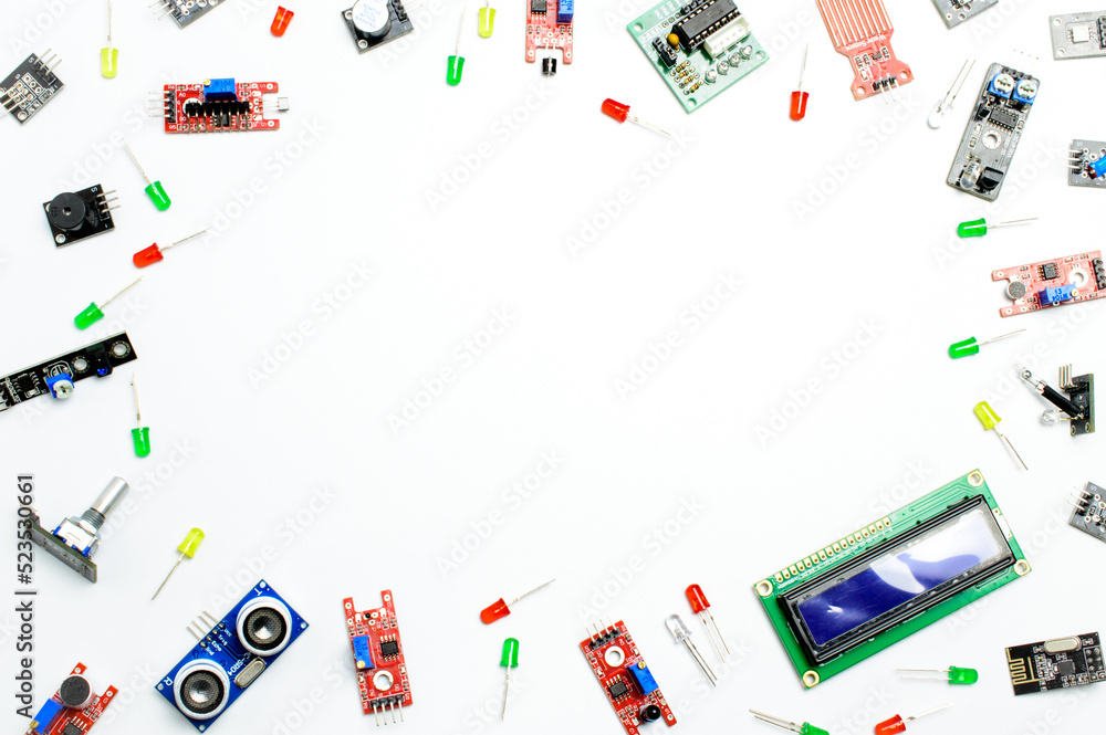 Top View Arduino Components And Modules Electric Parts On A White Background Concept Of A